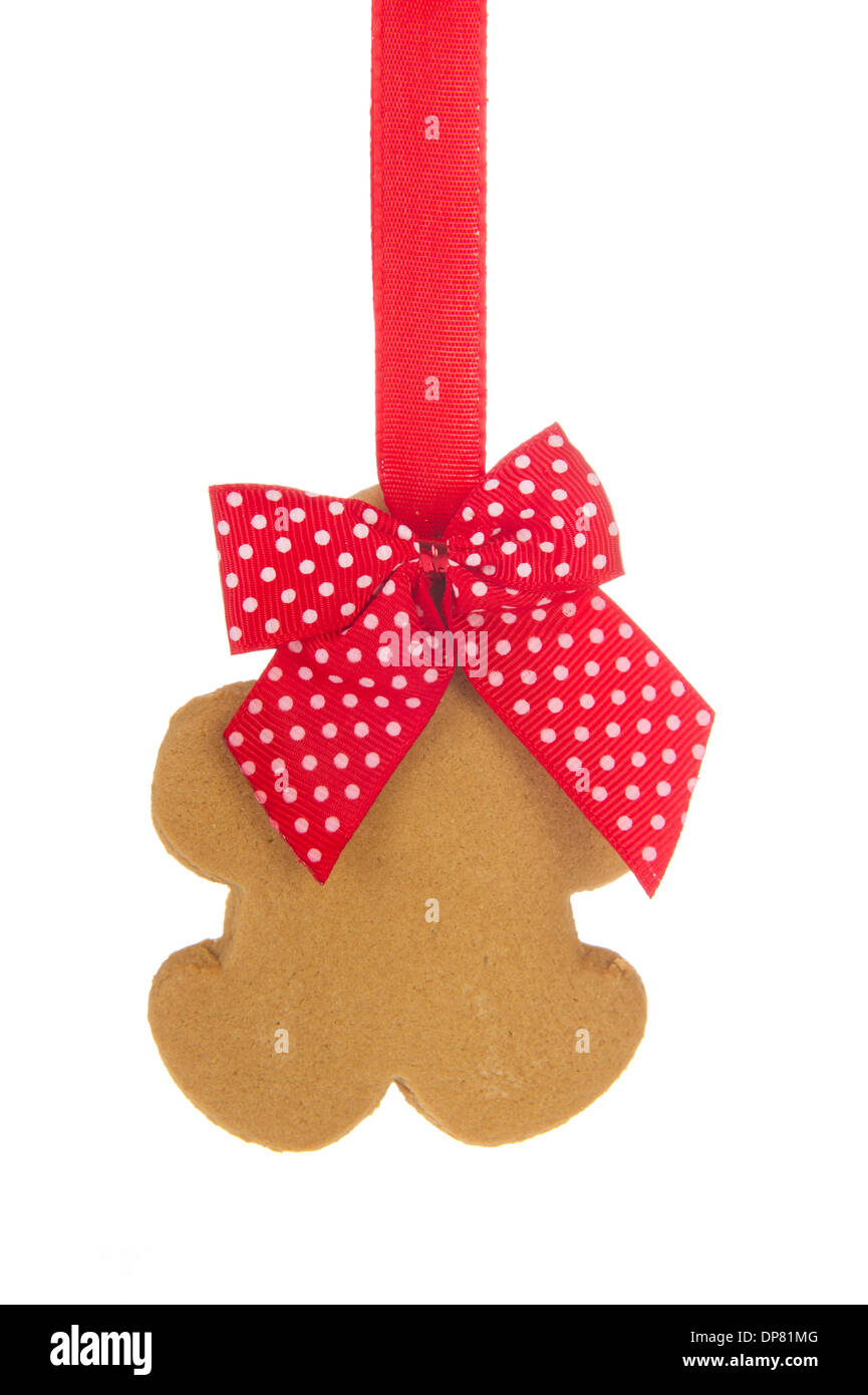 Hanging ginger bread man isolated over white background Stock Photo - Alamy