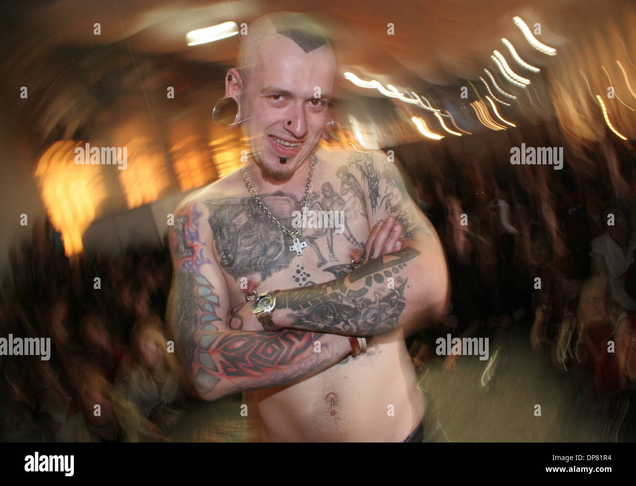 Jun 11, 2006 - St. Petersburg, Russia - A man shows off his body ...