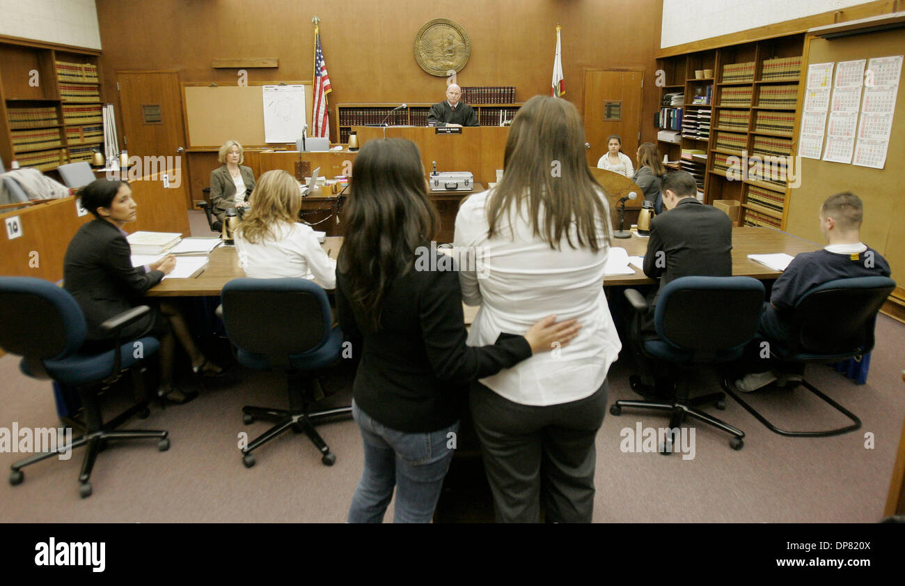 Jul 03, 2006 - San Diego, CA, USA - At center wearing white is a rape ...