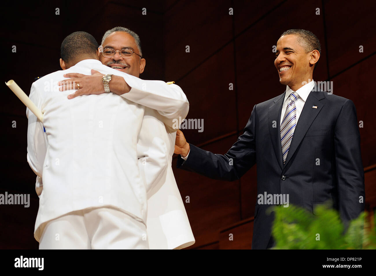 US President Barack Obama and retired Rear Adm. Stephen Rochon during ...