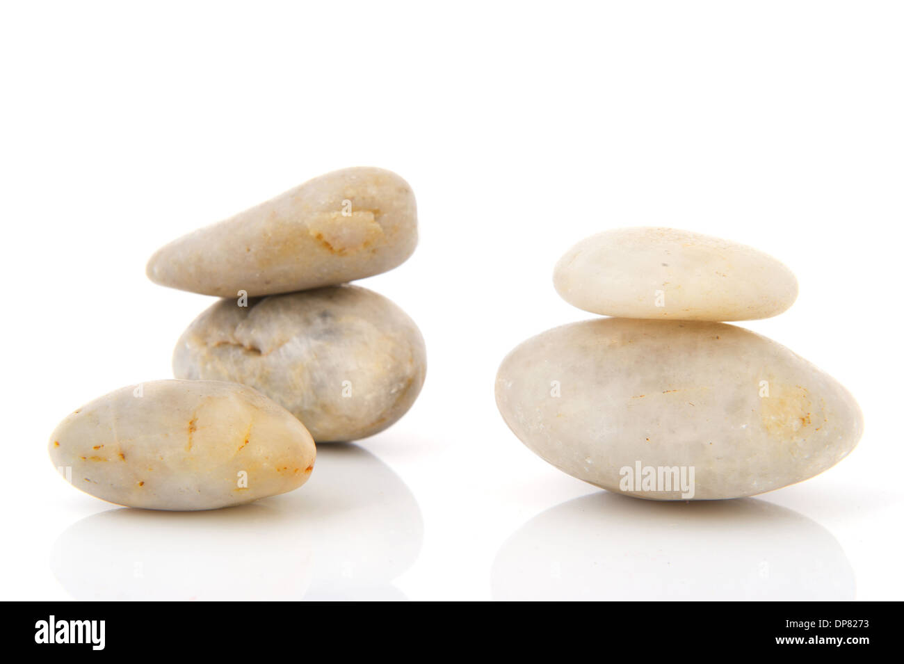 Stacked white pebbles isolated over white background Stock Photo - Alamy