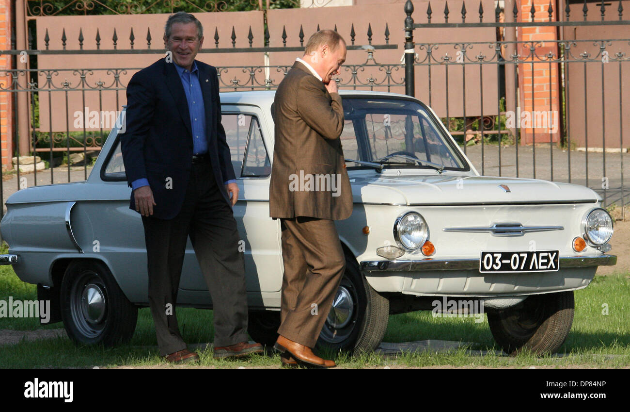 George Bush and Vladimir Putin - Putin shows to Bush his first car ...