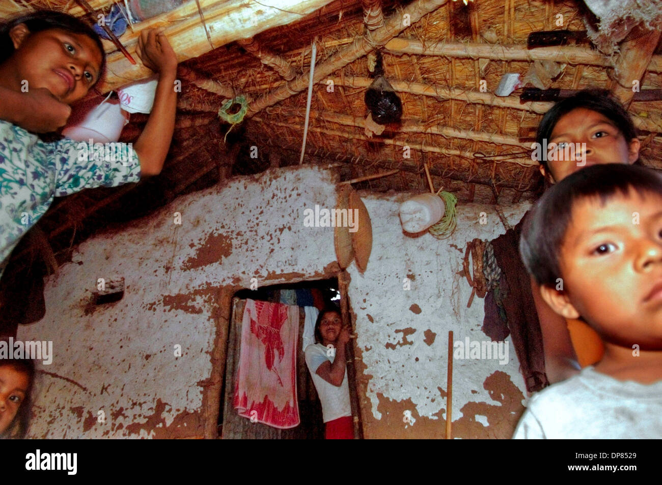 Jul 28, 2006 - Camiri, Bolivia - Children in their mud house in a poor ...