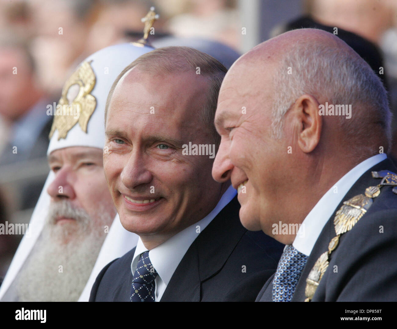 Vladimir Putin (C),Yuri Luzhkov (mayor of Moscow) (R) and Patriarch ...