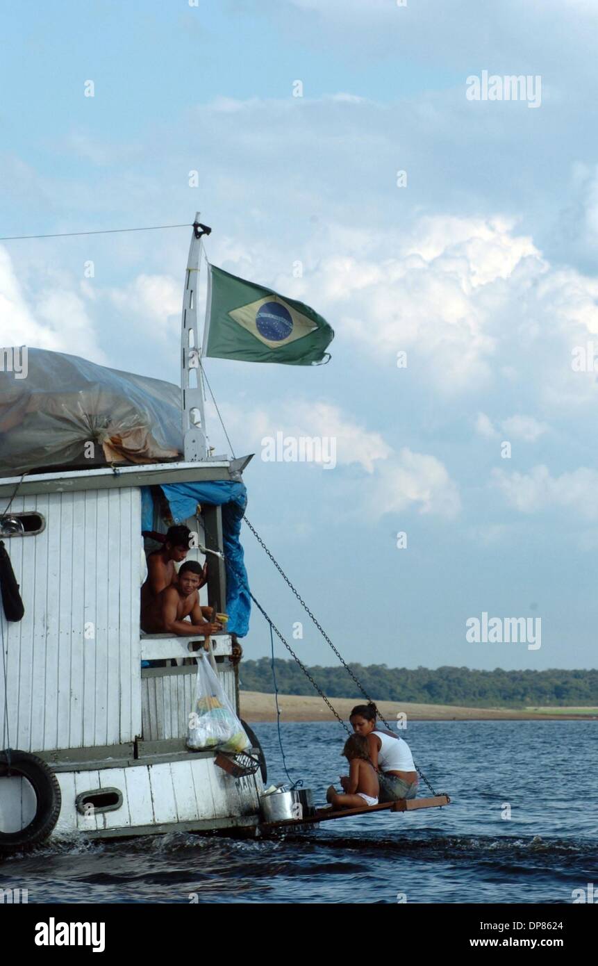 Oct 20, 2006 - Manaus, Brazil - People sit on a boat sailing on the ...