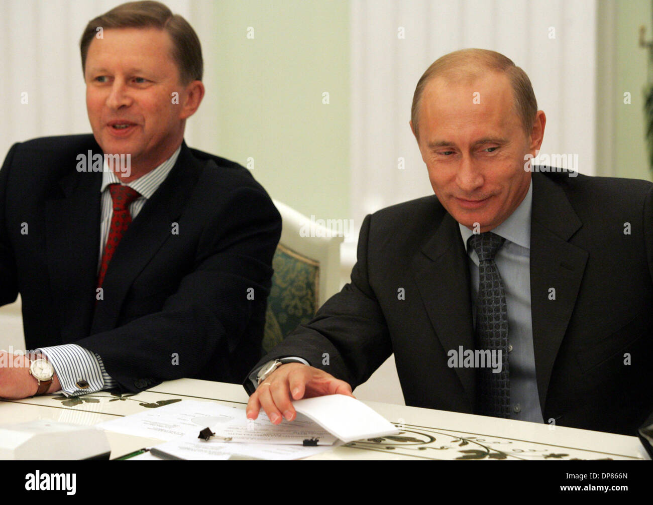 Vladimir Putin and Russian Defence Minister Sergei Ivanov while the ...