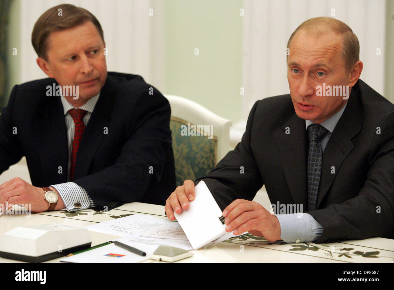 Vladimir Putin and Russian Defence Minister Sergei Ivanov while the ...