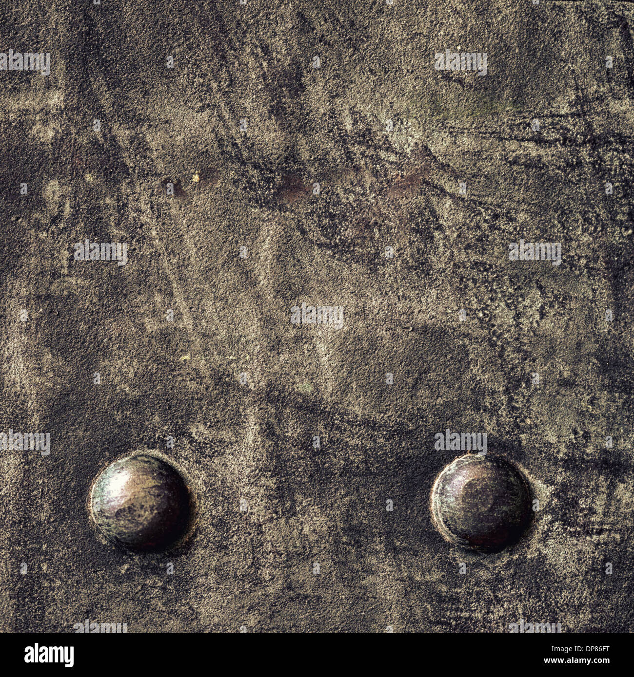 Closeup of grunge gray grey metal plate with rivets and screws as ...