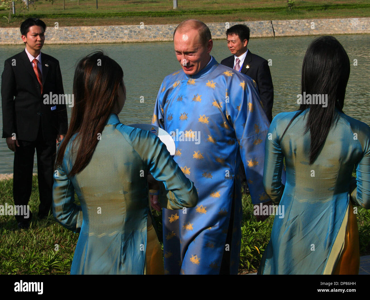 Russian President Vladimir Putin (C) is looking for a girl with the ...