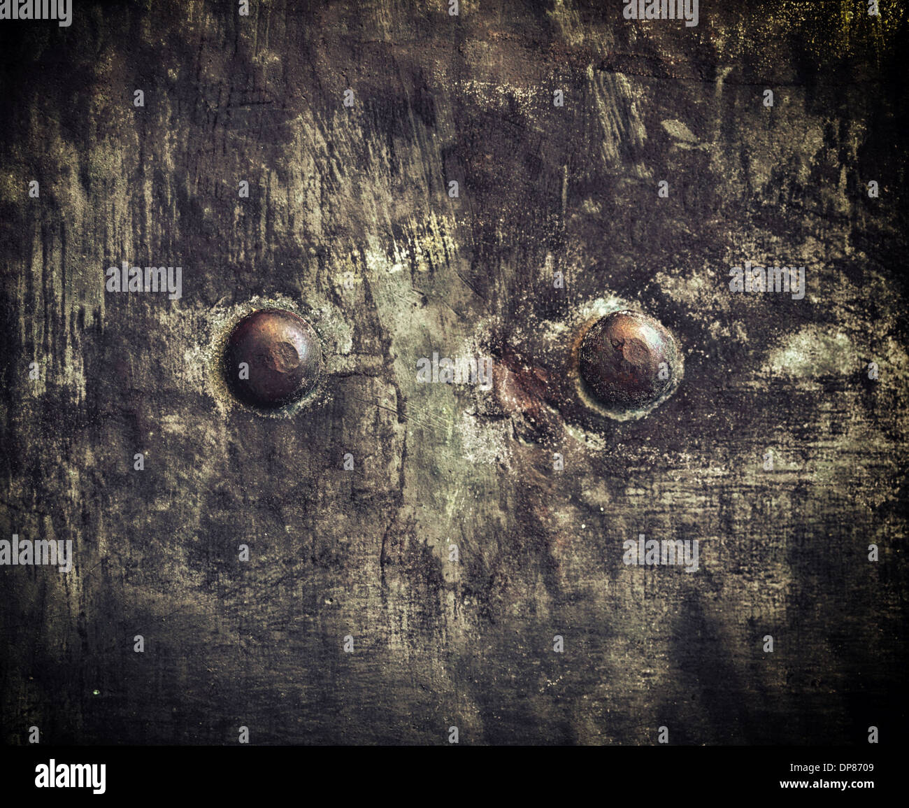 Closeup of grunge gray grey metal plate with rivets and screws as ...