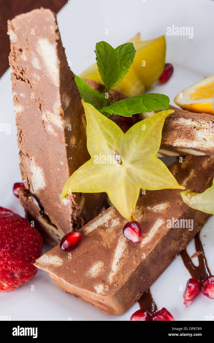 Chocolate block with pineapple stars and strawberry Stock Photo - Alamy