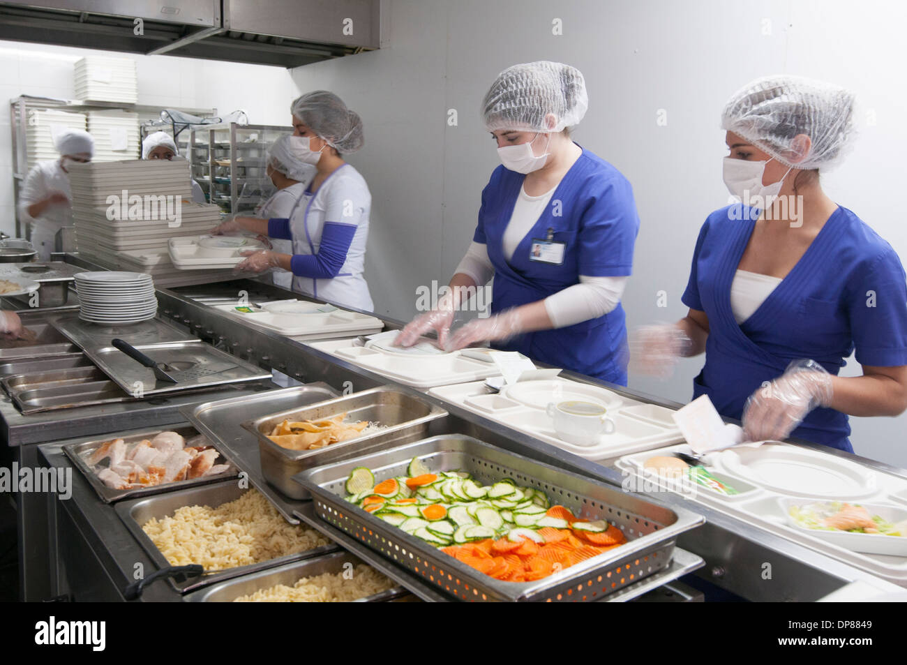 Nutritionists, professional health area preparing food in a hospital ...