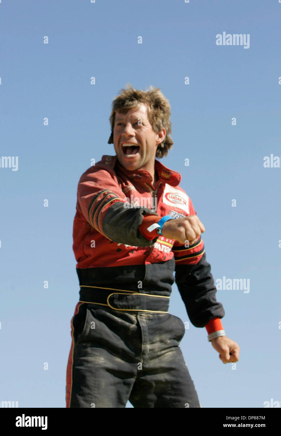 (Published 9/26/2005, E-3) Johnny Greaves jumped on top of his car and ...