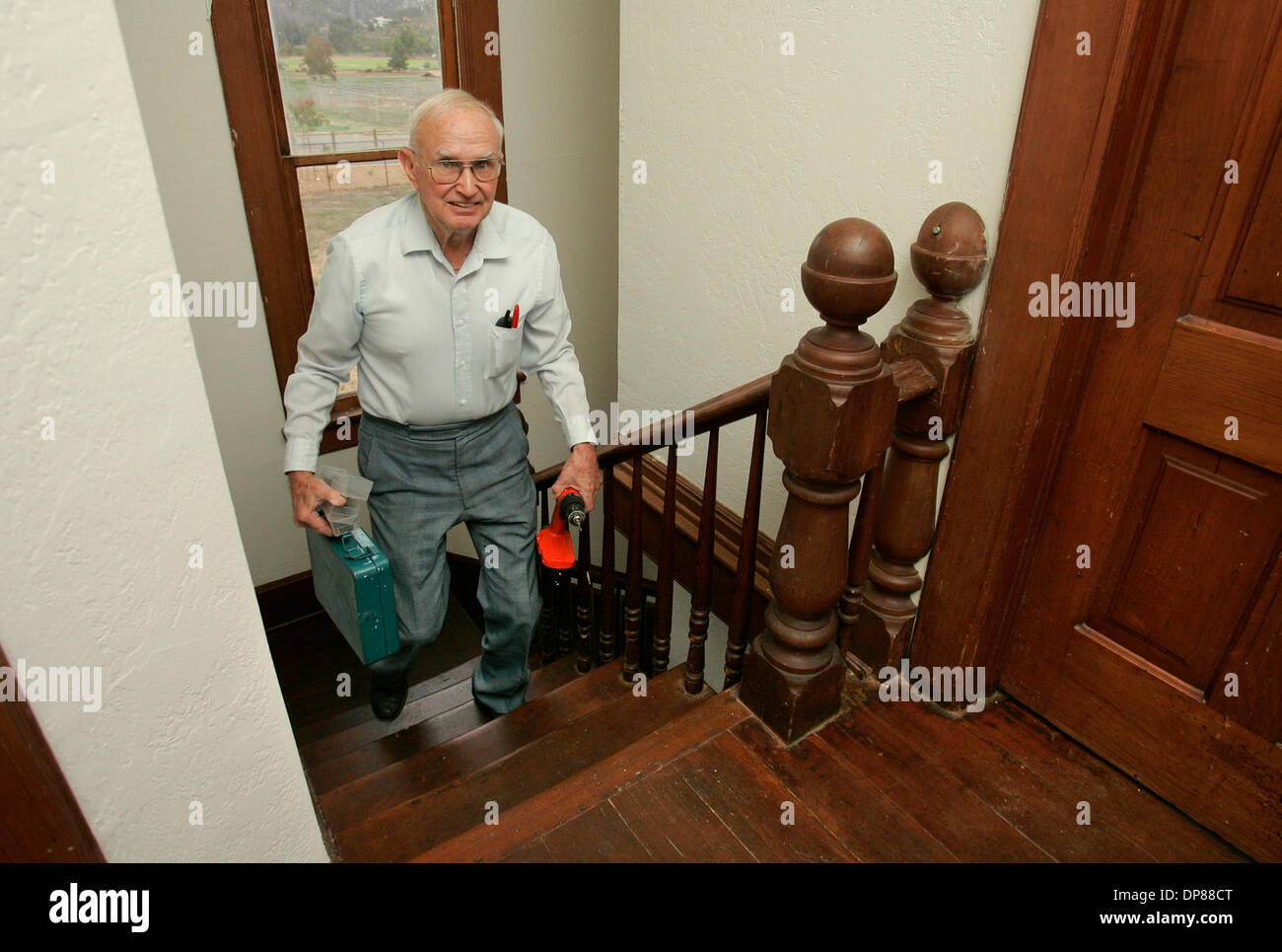 (Published 11/27/2005, N-6) ROY HASKINS climbs the stairs with tools to ...