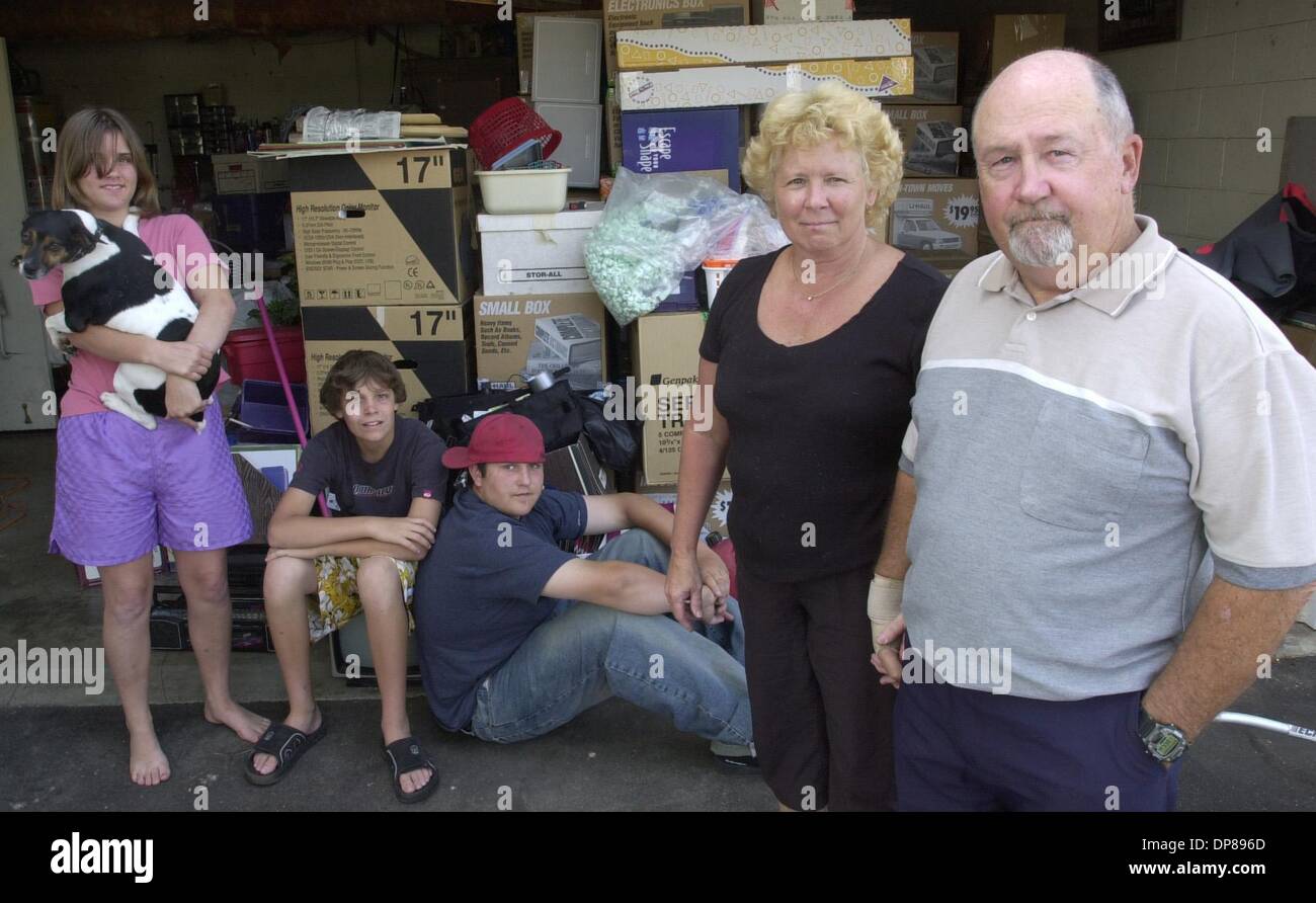 (Published 6/27/2004, E-2; UTS1815819) The Maher family (from right ...