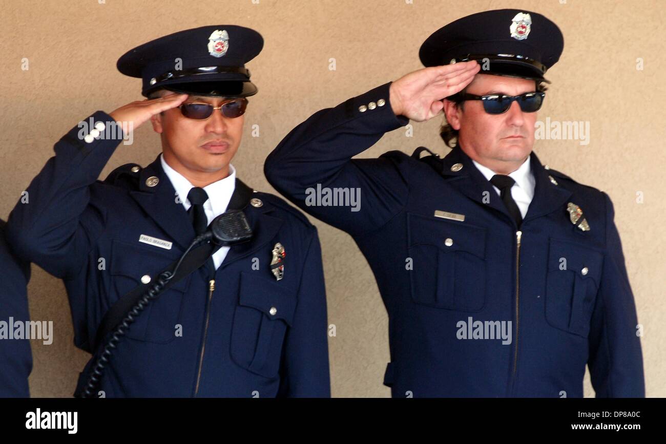 Firefighters stand at attention as the casket of Contra Costa County ...
