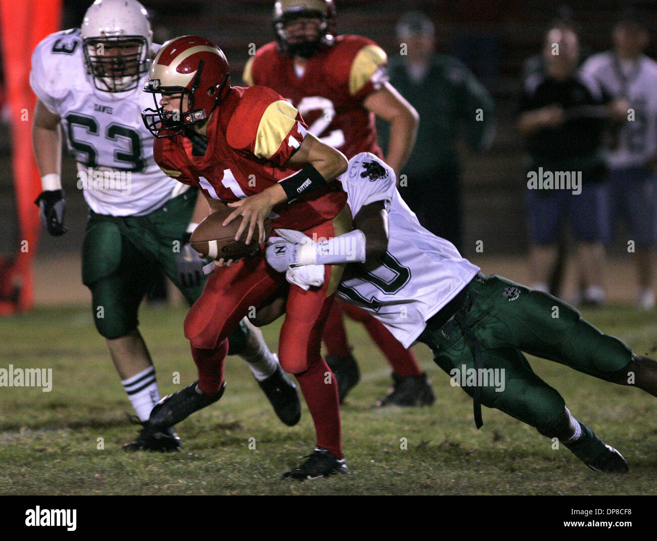 (Published 9/10/2005, D-8:2,6) Fallbrook QB AARON HOLT gets brought ...