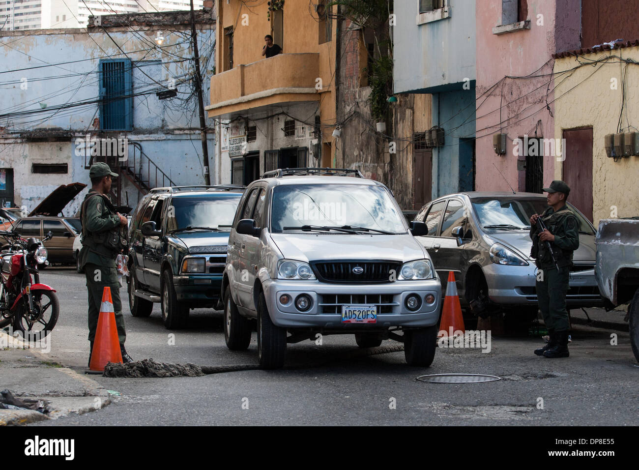 Caracas, Venezuela. 8th Jan, 2014. Military personnel stand guard at a ...