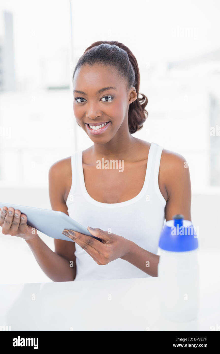 Smiling sporty model posing Stock Photo - Alamy