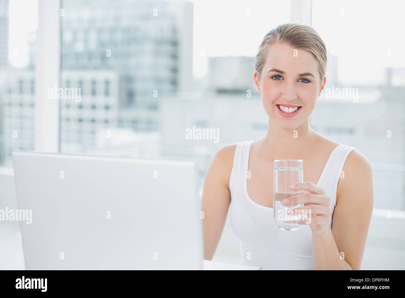 Female holding water tank hi-res stock photography and images - Alamy