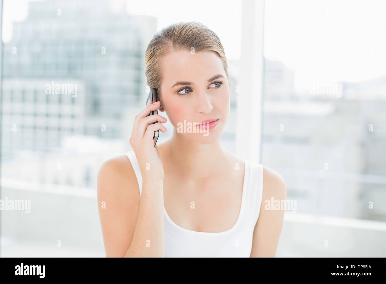 Woman phone call thinking hi-res stock photography and images - Alamy
