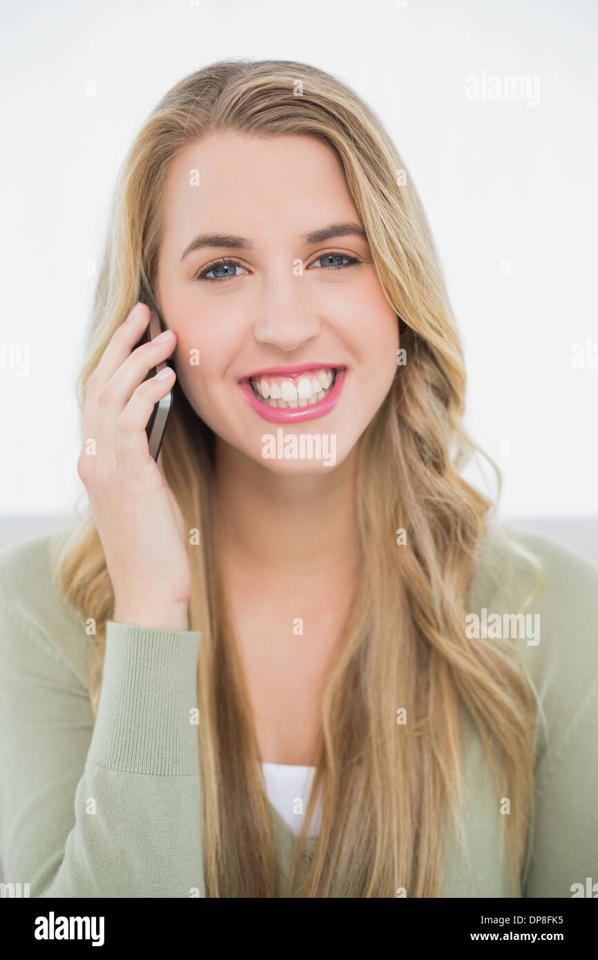 Happy pretty blonde on the phone Stock Photo - Alamy