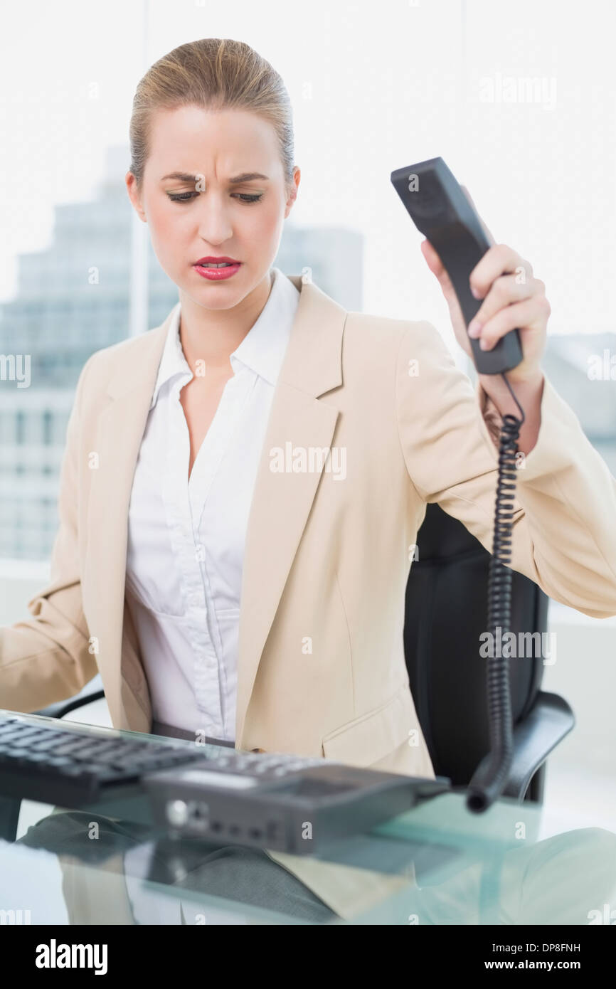 Woman tied up telephone hi-res stock photography and images - Alamy