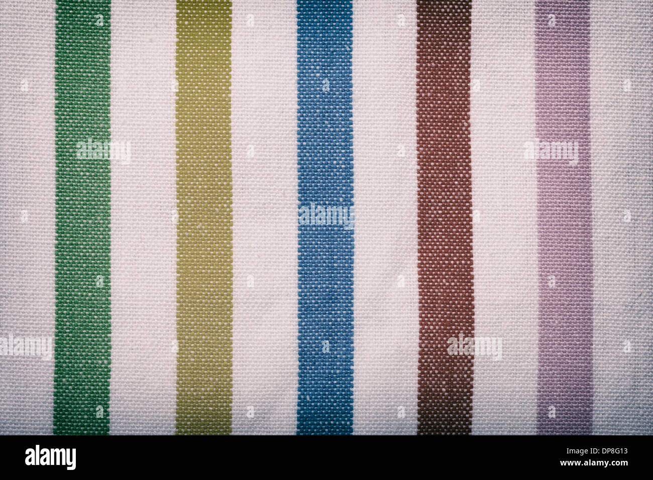 Closeup of colorful vertical striped fabric textile as background ...