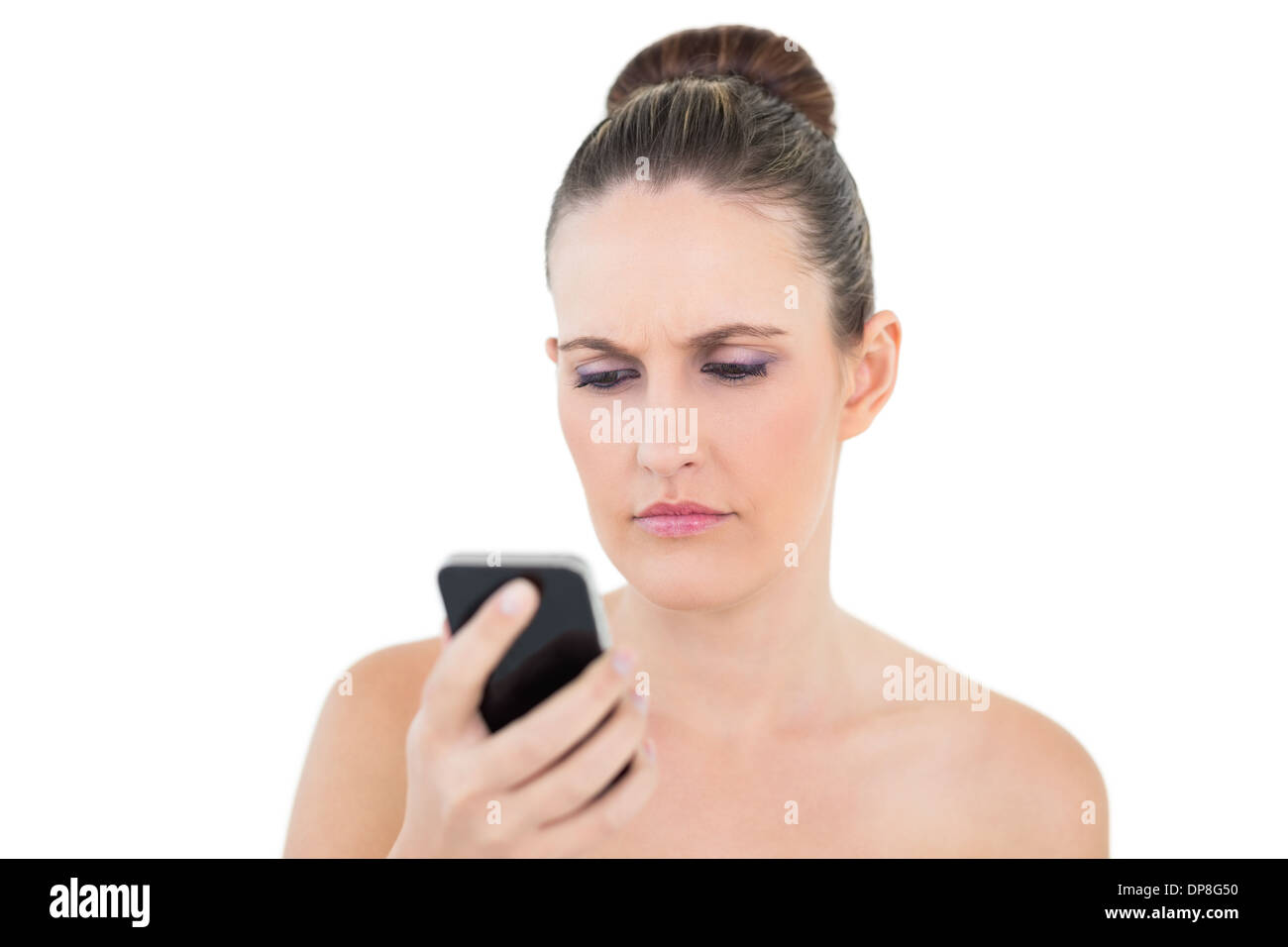 Angry woman looking at her phone Stock Photo - Alamy