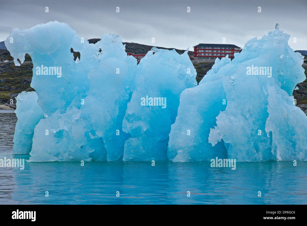 Grounded iceberg in front of Arctic Inn, Ilulissat, West Greenland ...