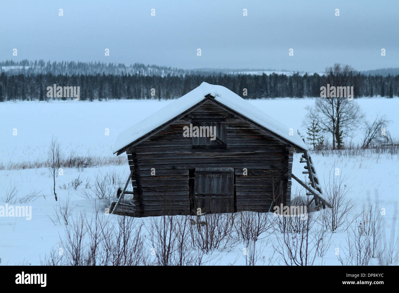 Wooden house in snow hi-res stock photography and images - Alamy