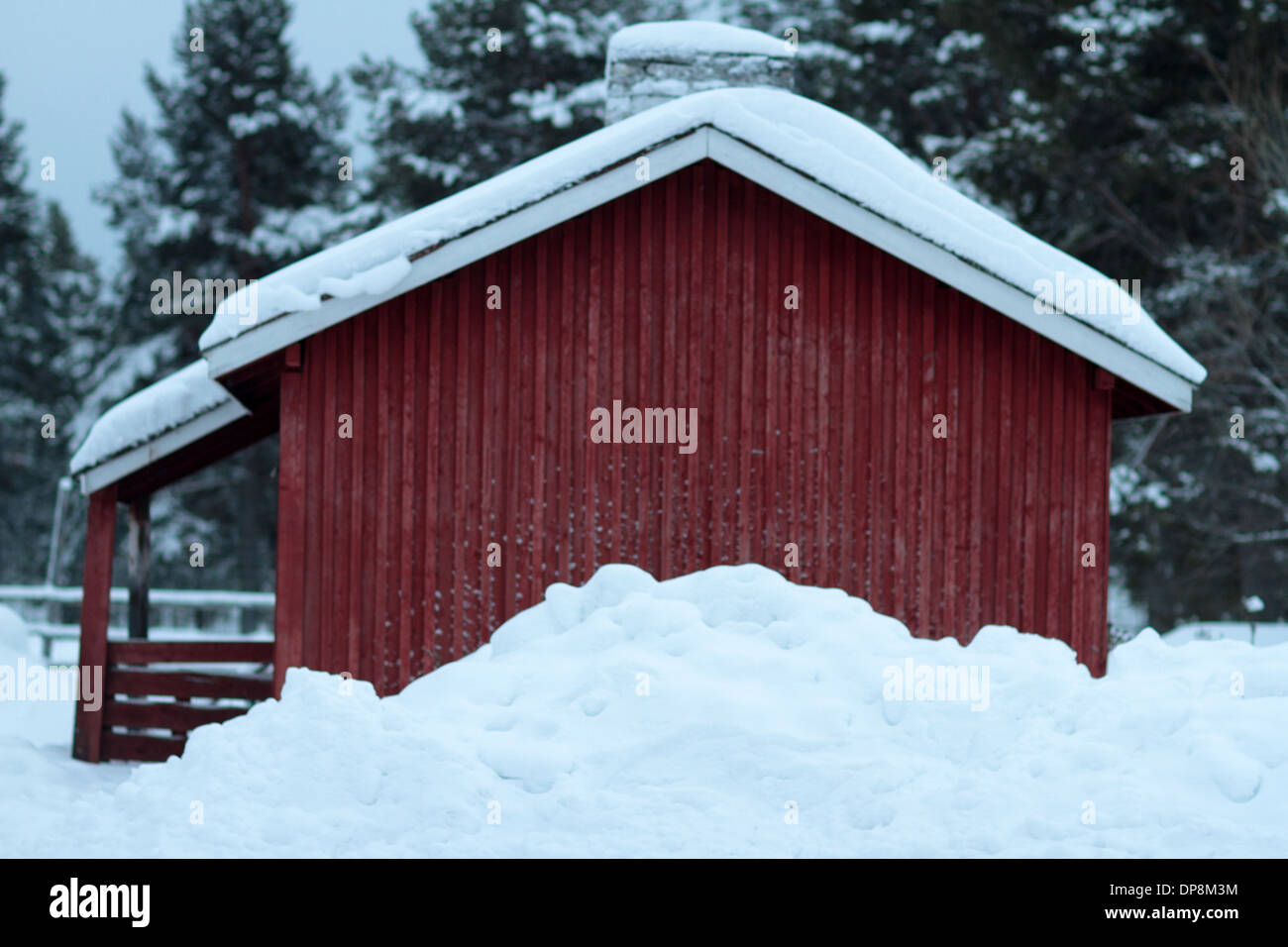 Wooden house in snow hi-res stock photography and images - Alamy