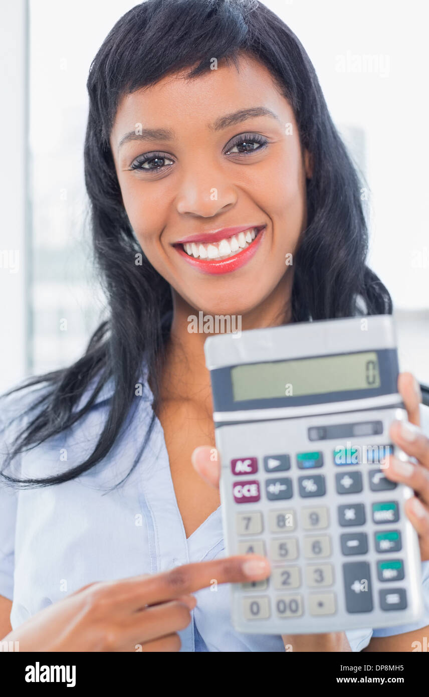 Woman pointing hand calculator hi-res stock photography and images - Alamy