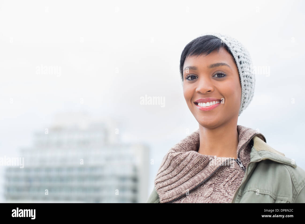 Attractive young model in winter clothes posing Stock Photo - Alamy