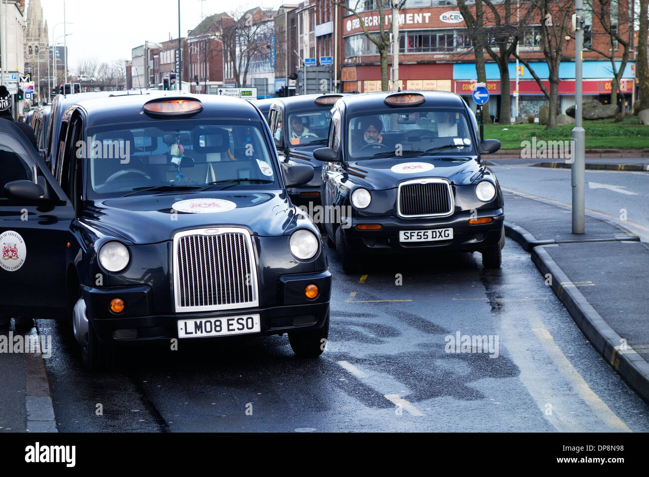 Black cab taxis waiting in Leicester, UK Stock Photo - Alamy