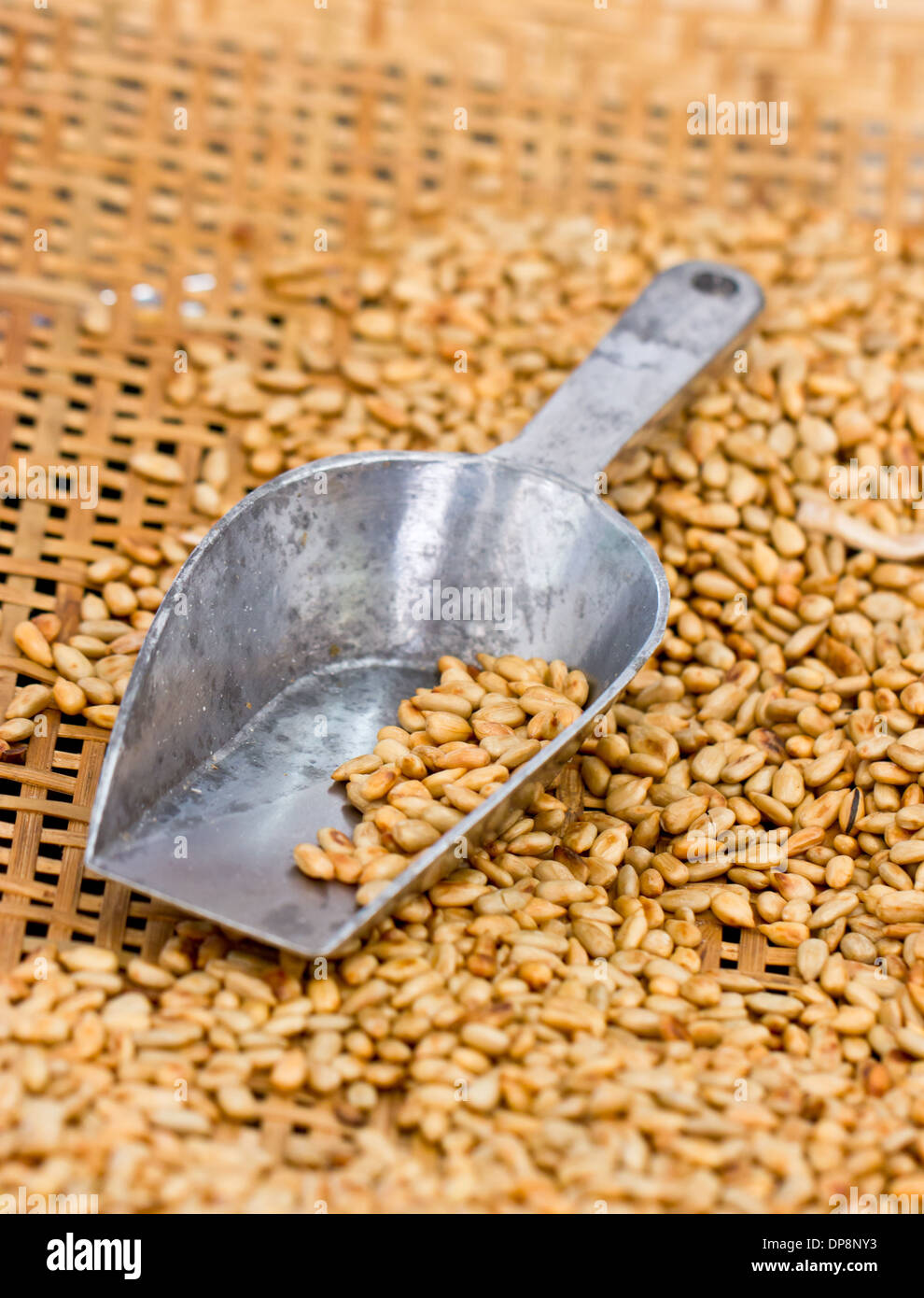 Fried Sunflower Seed With Metal Scoop In Bamboo Basket Stock Photo - Alamy