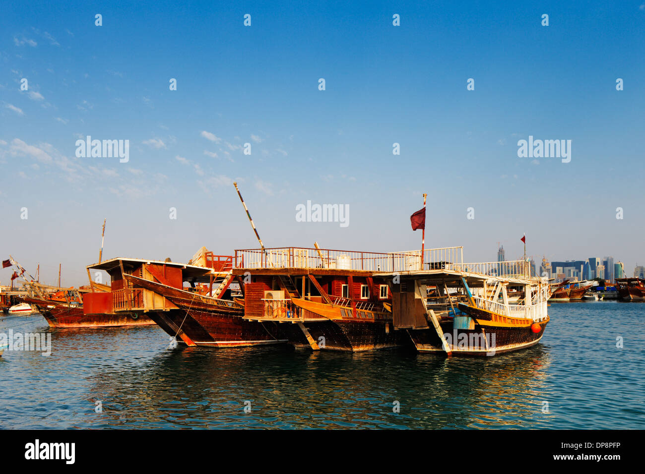 Doha, Qatar: Traditional sail boats called Dhows add life and energy to ...