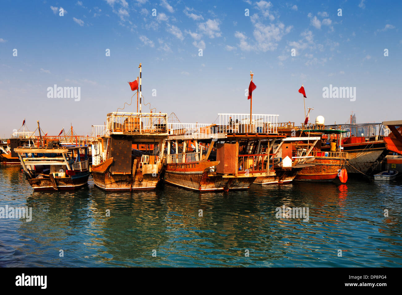 Doha, Qatar: Traditional sail boats called Dhows add life and energy to ...