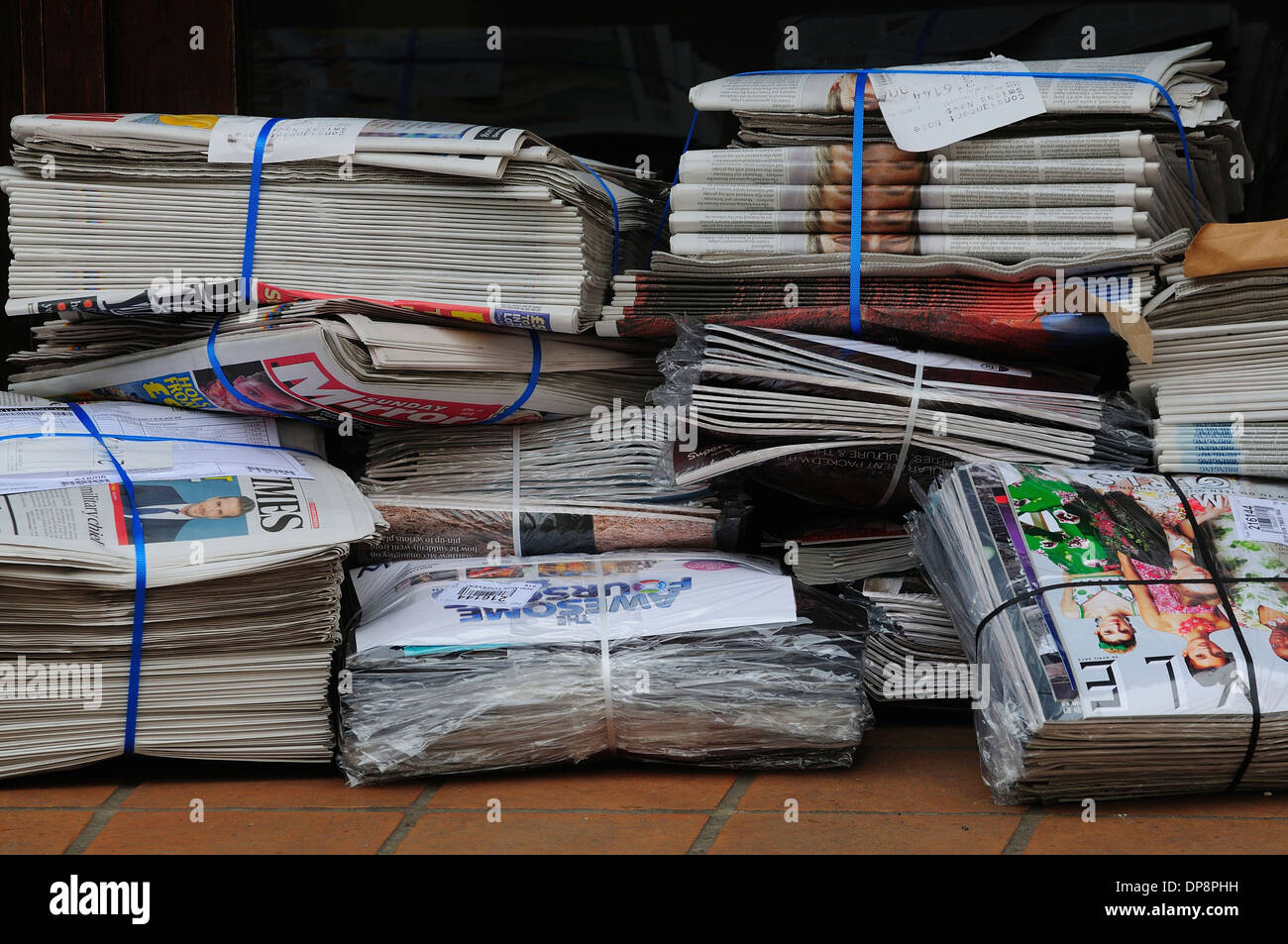 Bundles of newspapers UK Stock Photo - Alamy