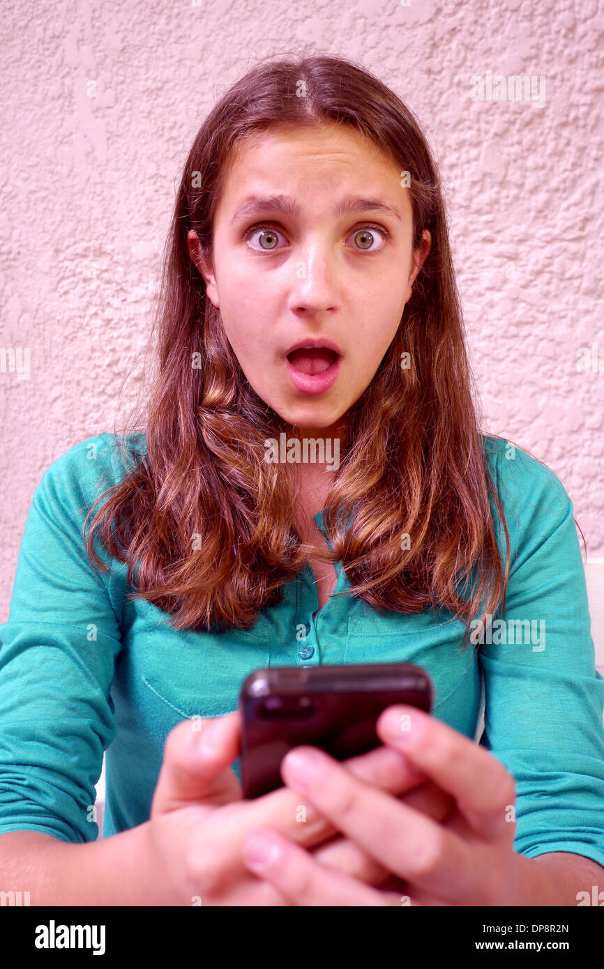 Girl text message shock hi-res stock photography and images - Alamy