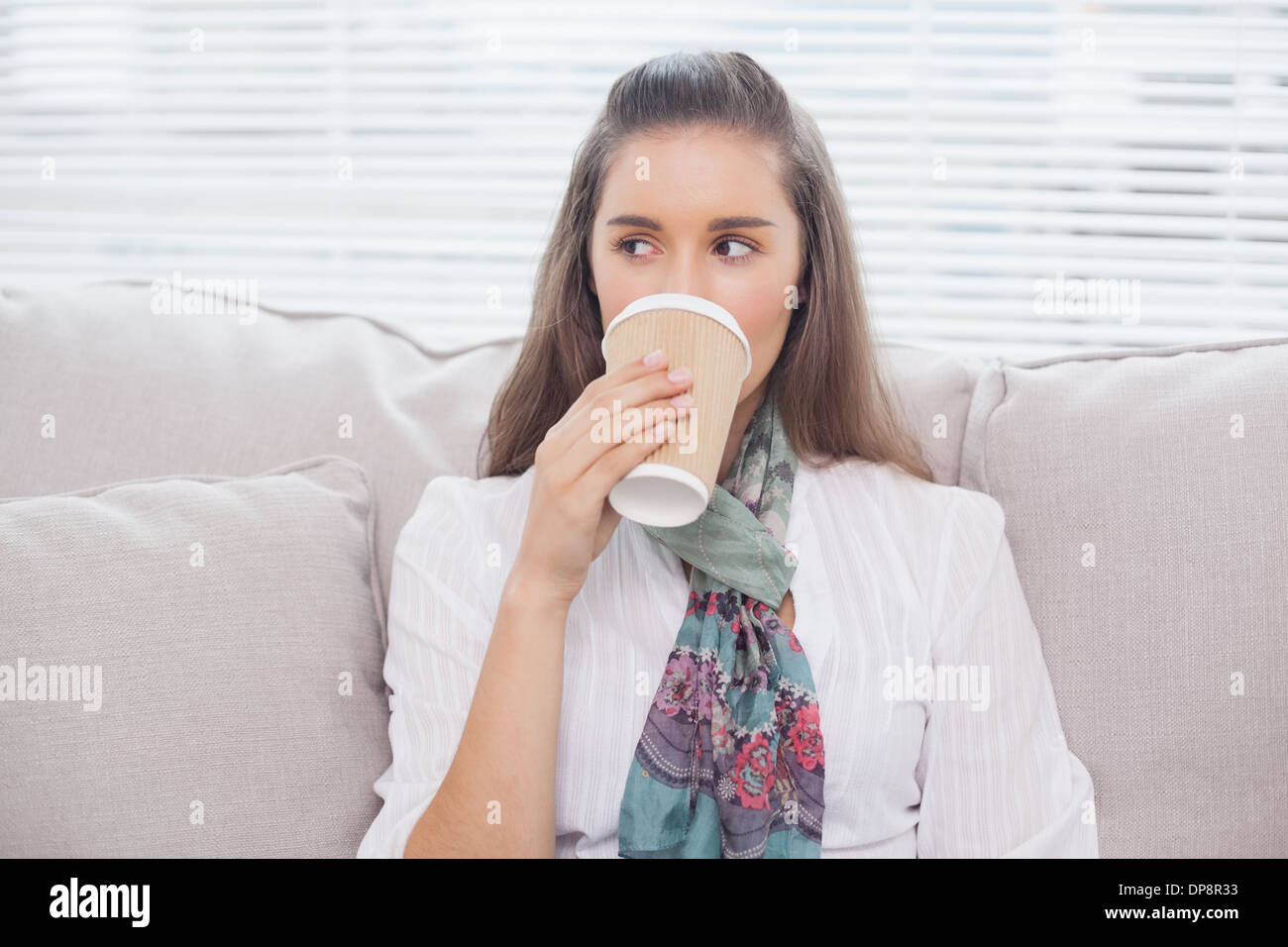 Pretty model drinking coffee Stock Photo - Alamy
