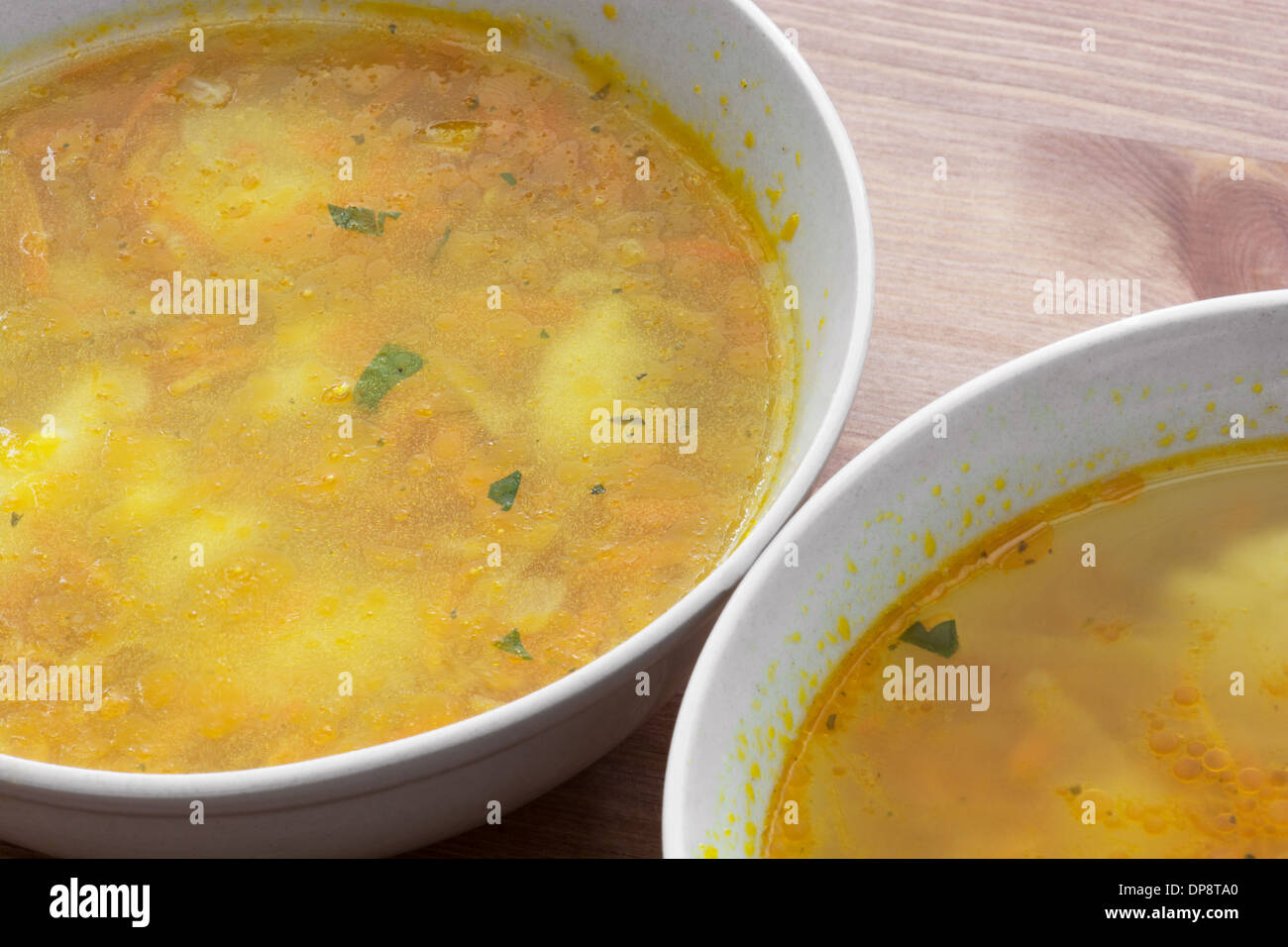 Ceramic plates with vegetable soup Stock Photo - Alamy