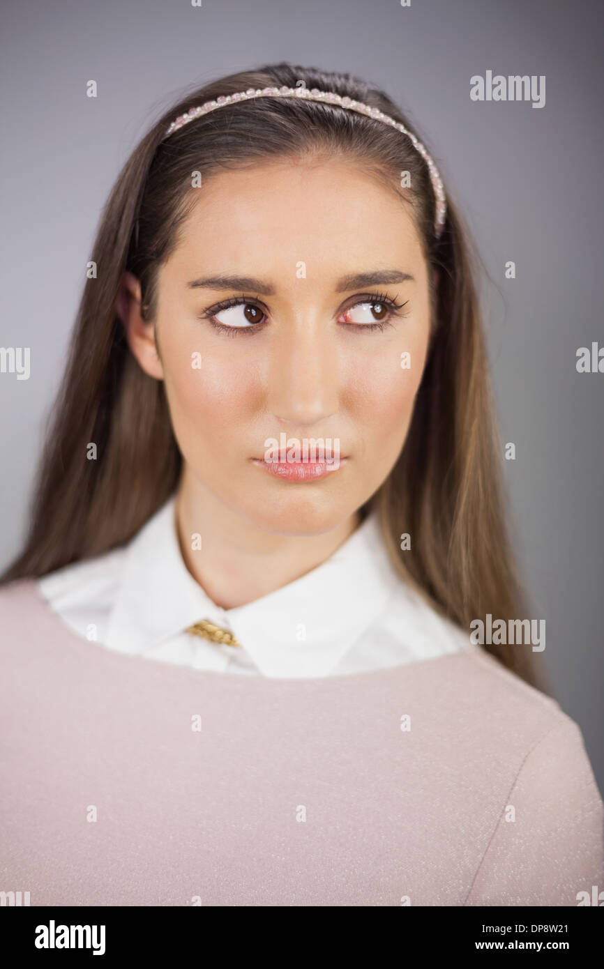 Thoughtful female fashion model hi-res stock photography and images - Alamy