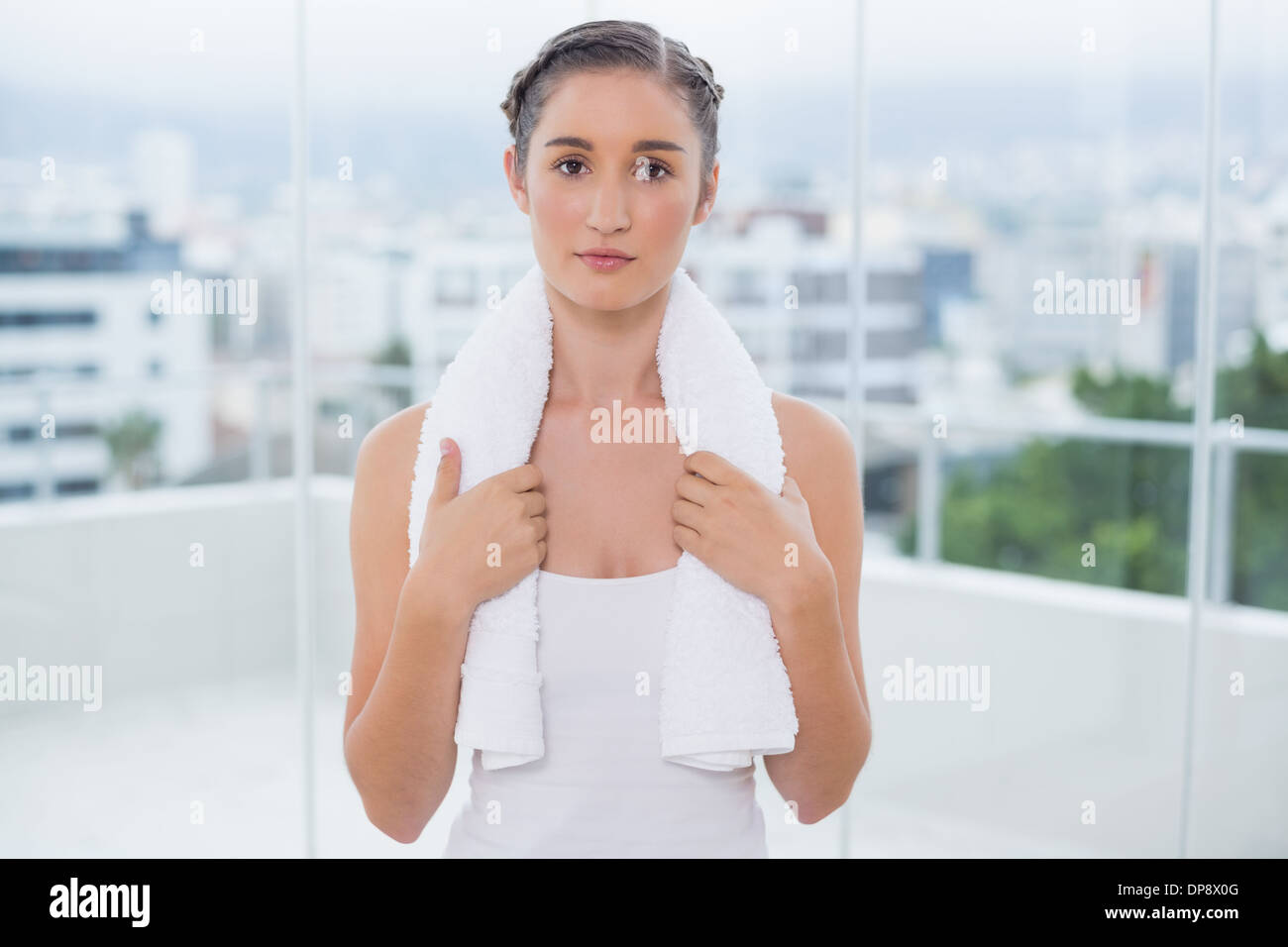 Girl holding towel hi-res stock photography and images - Alamy