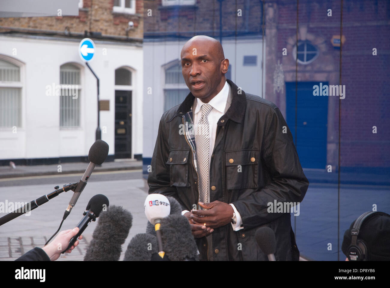 London, UK. 9th January 2014. Nims Obunge speaks outside New Scotland ...