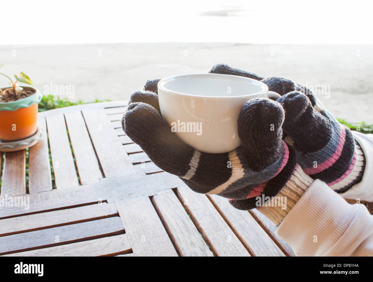 Hot cup of coffee in winter, stock photo Stock Photo - Alamy