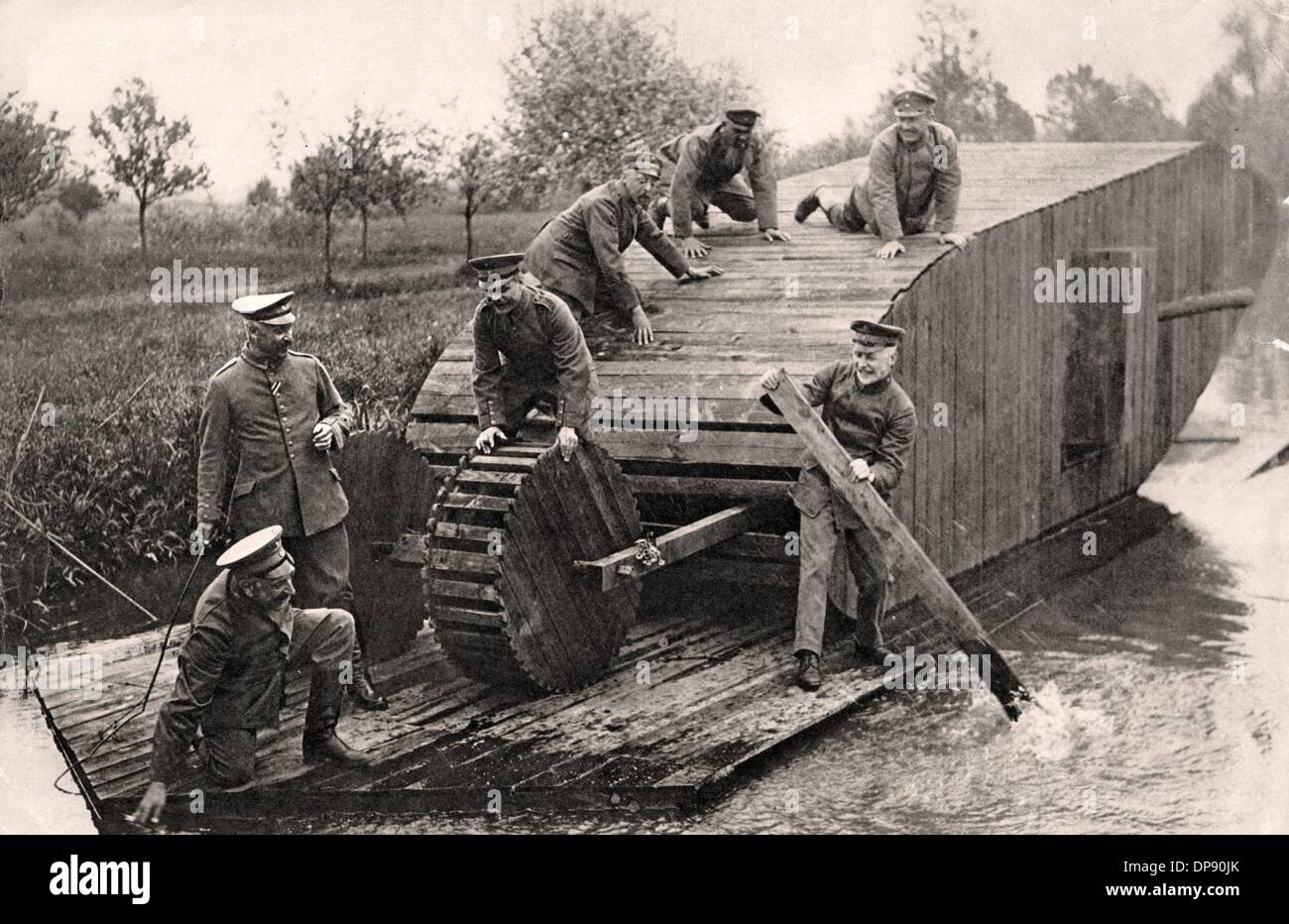 German soldiers navigate a wooden "panzer" raft, place and date unknown ...