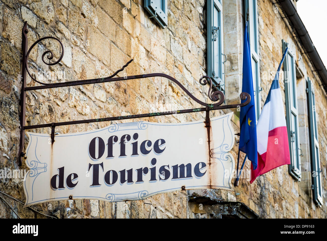 Old Tourist Office sign on traditional old stone building, Place de la ...