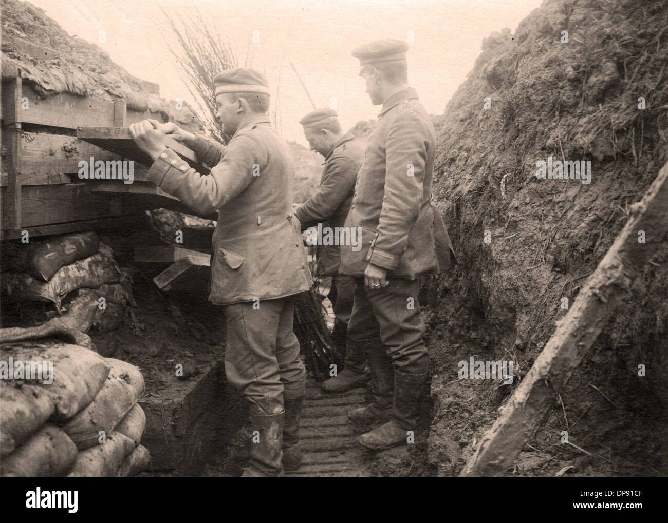 German soldiers constructing and maintaining a trench in Flanders ...
