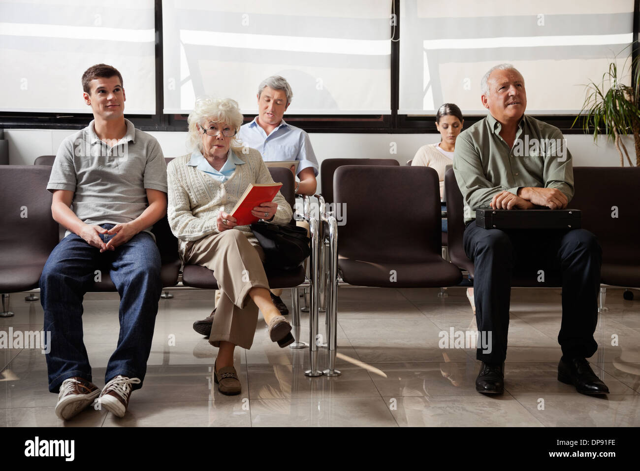 People Sitting In Hospital Lobby Stock Photo - Alamy